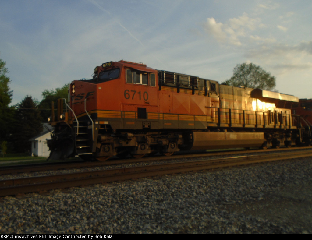 BNSF 6710 leading a stack Train East
